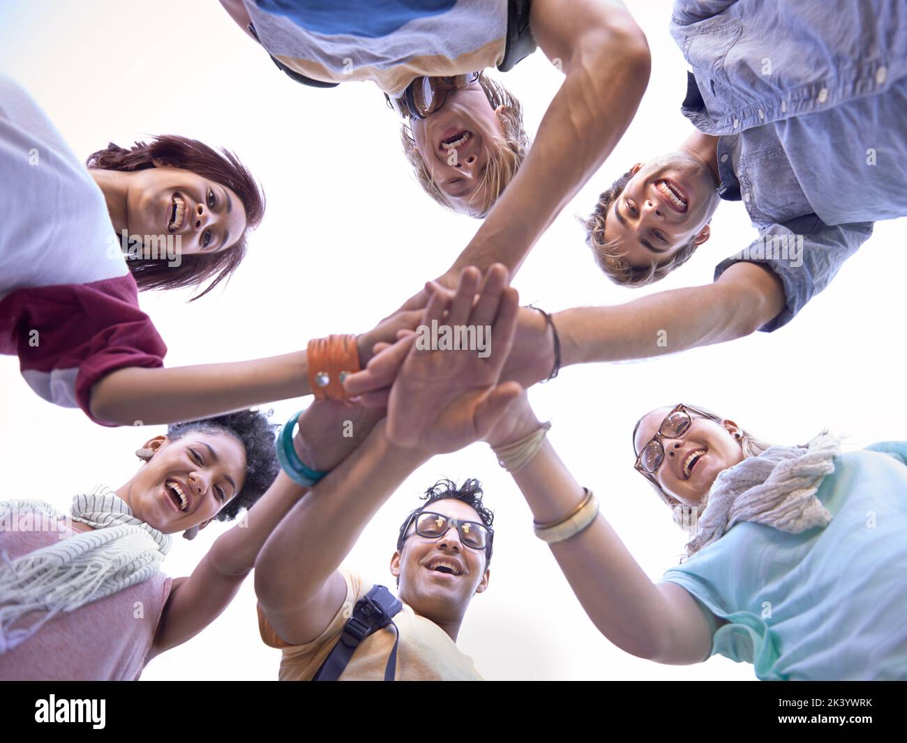 Were in this together. Low angle portrait of a group of students ...