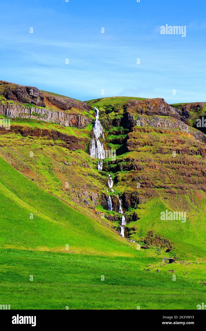 A vertical shot of the Grundarfoss Waterfall, Iceland Stock Photo - Alamy