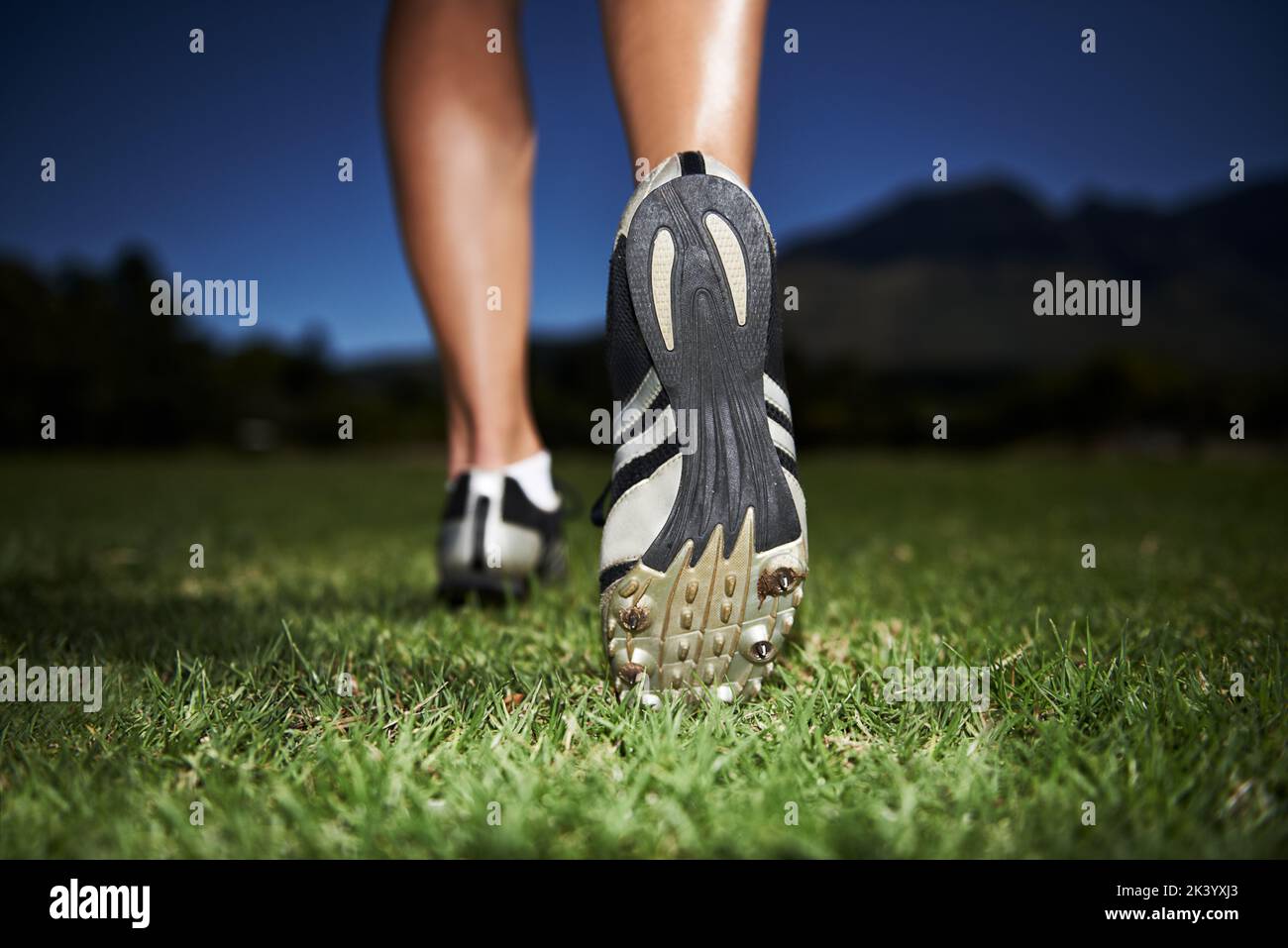Taking on the world one step at a time. Closeup of a runners feet Stock ...