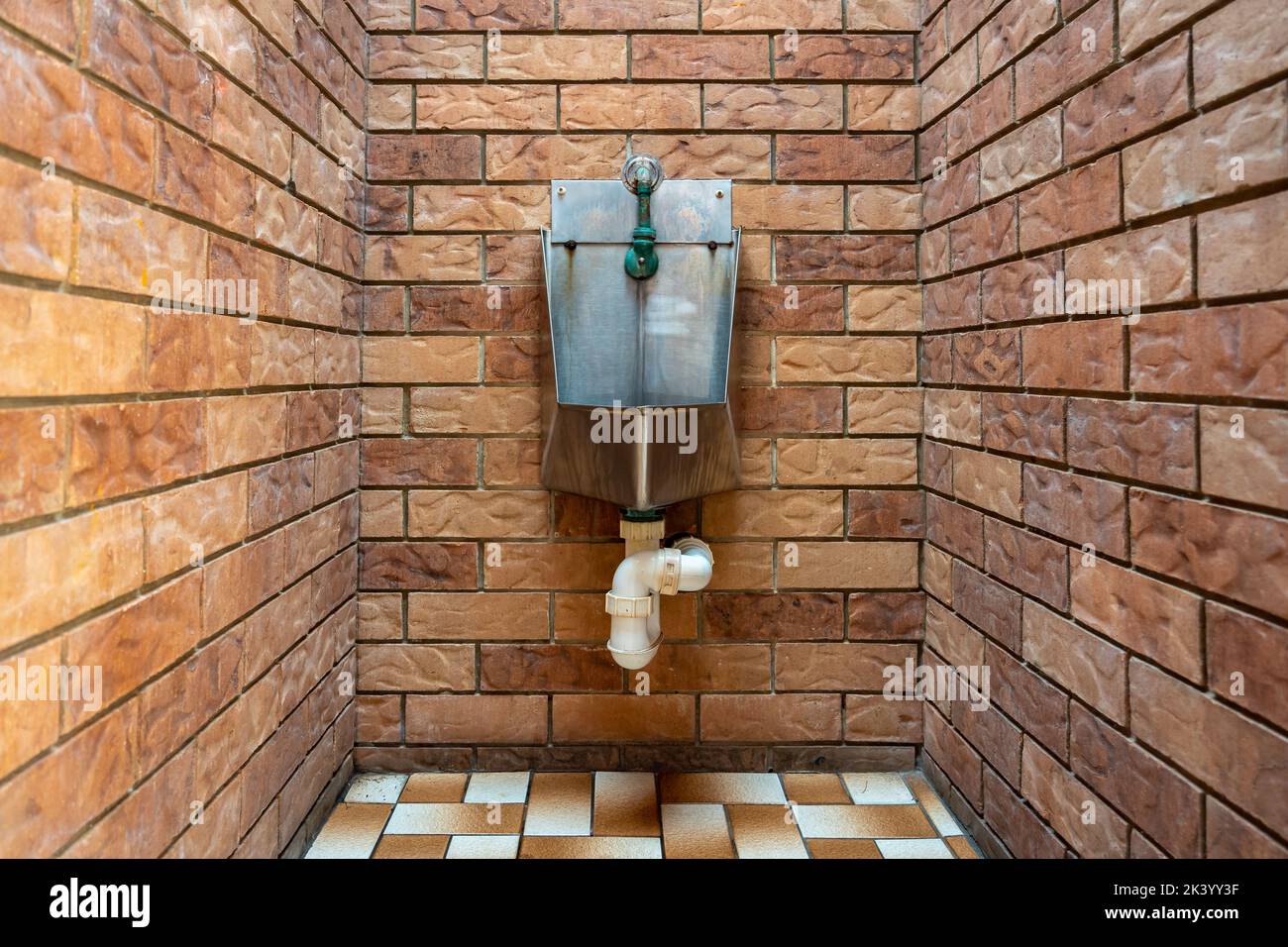 Old style urinal in a man's public toilet Stock Photo - Alamy