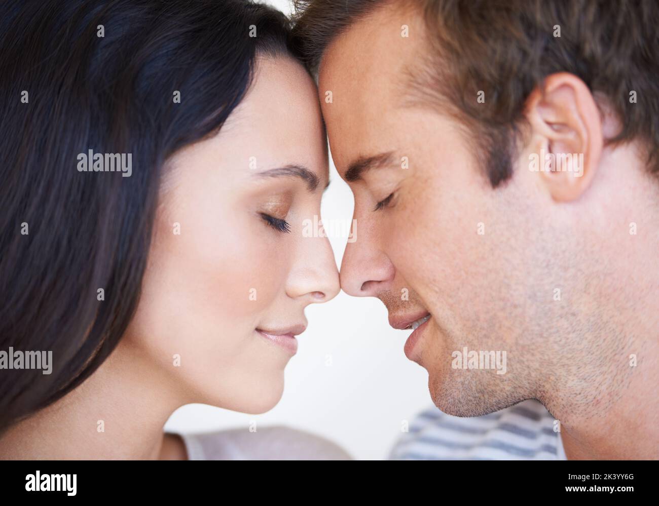 Well be together forever. A young loving couple facing each other Stock ...