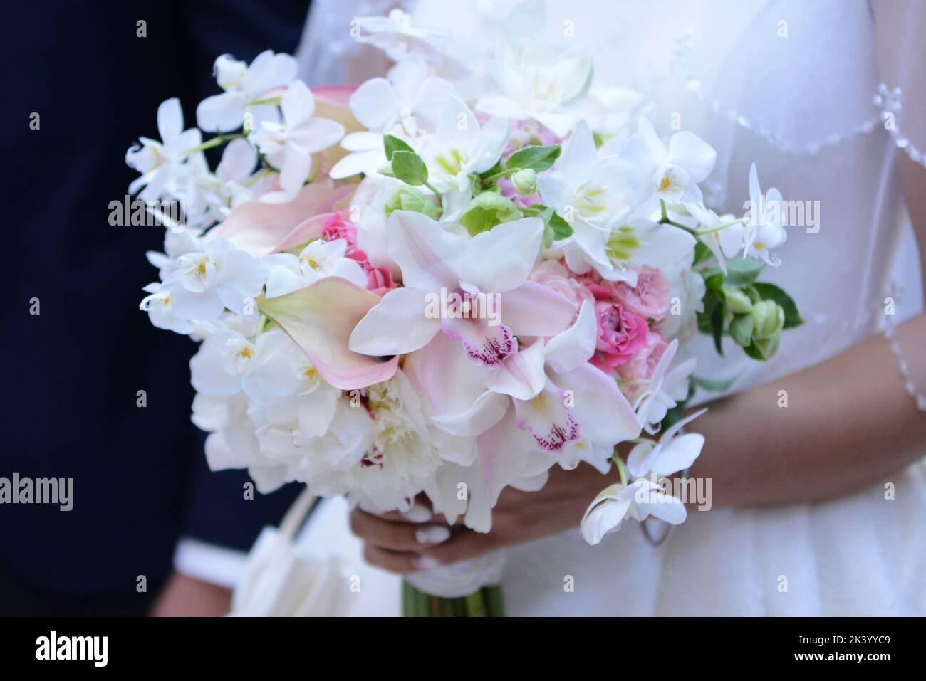 Wonderful bridal bouquet. Lily, roses, orchids Stock Photo - Alamy
