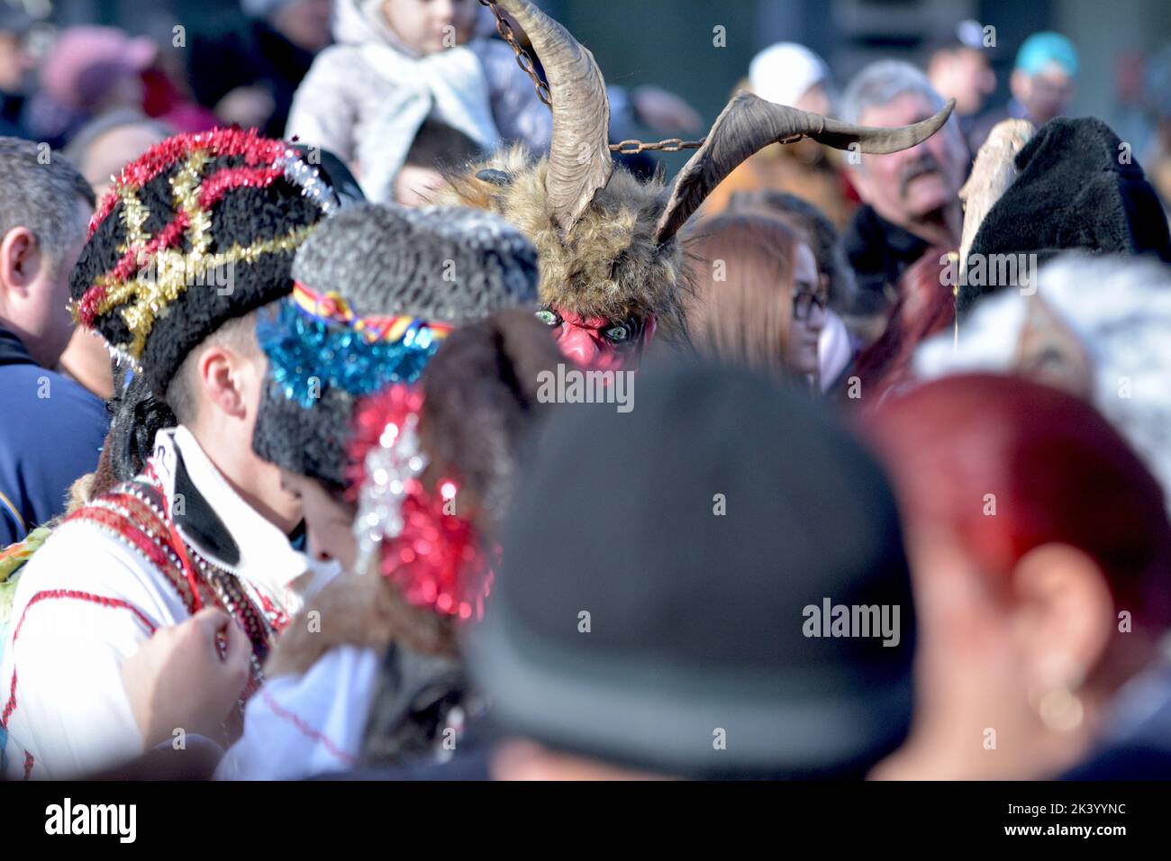 Monster / Devil mask focused on the crowd.The annual Winter Traditions ...