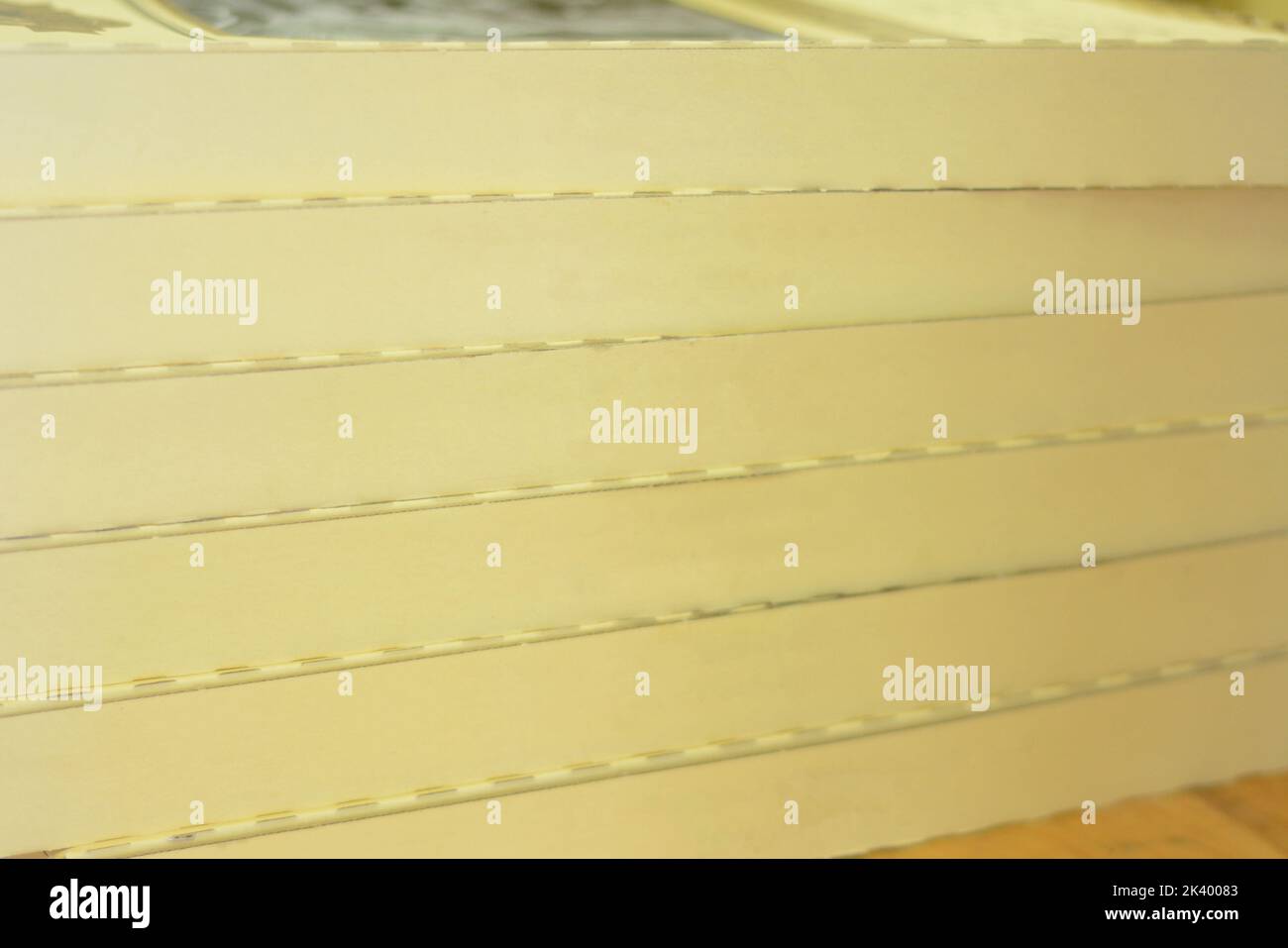 Perforated cardboard sheet in strips Stock Photo - Alamy