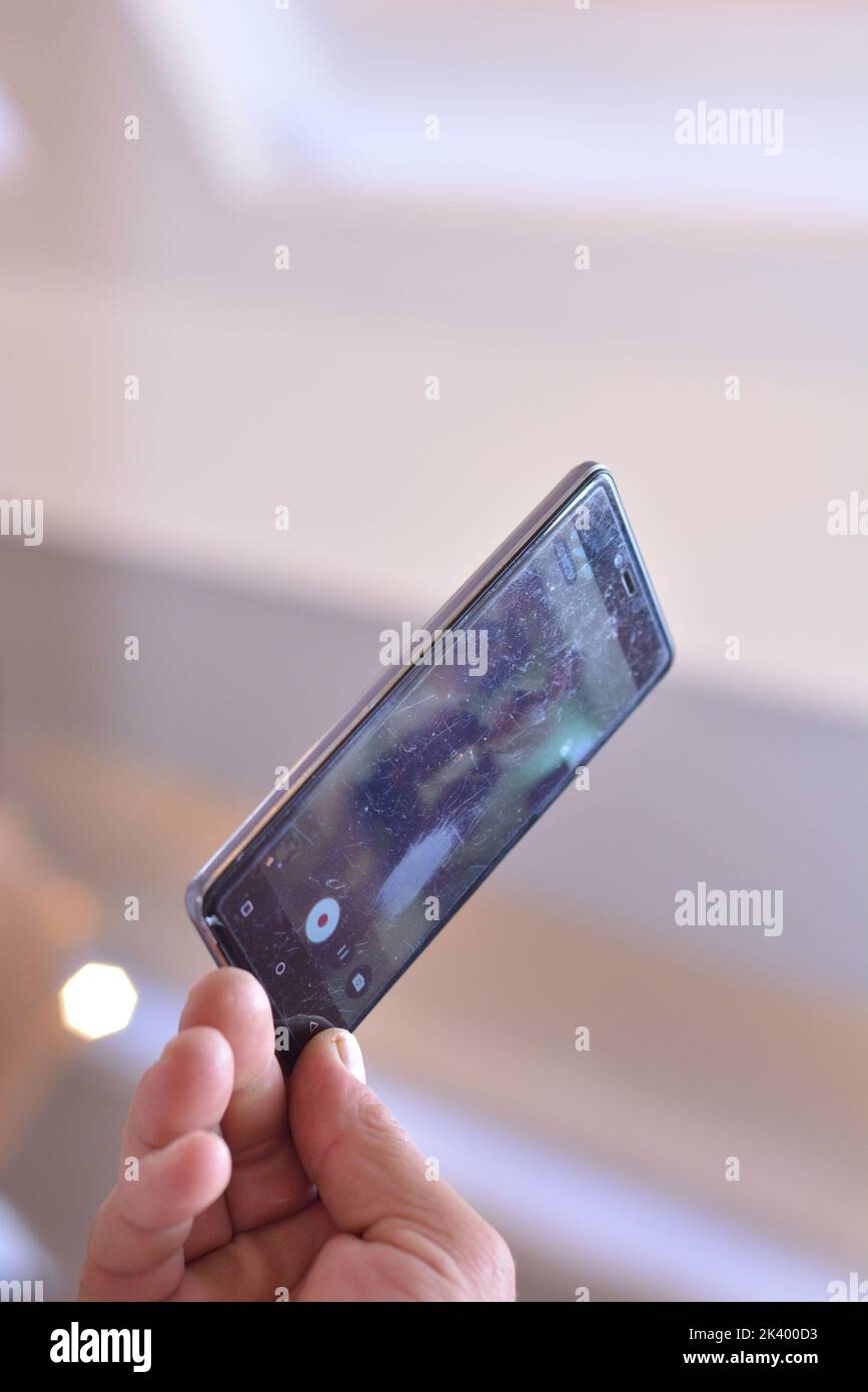 Old phone scratched Stock Photo - Alamy