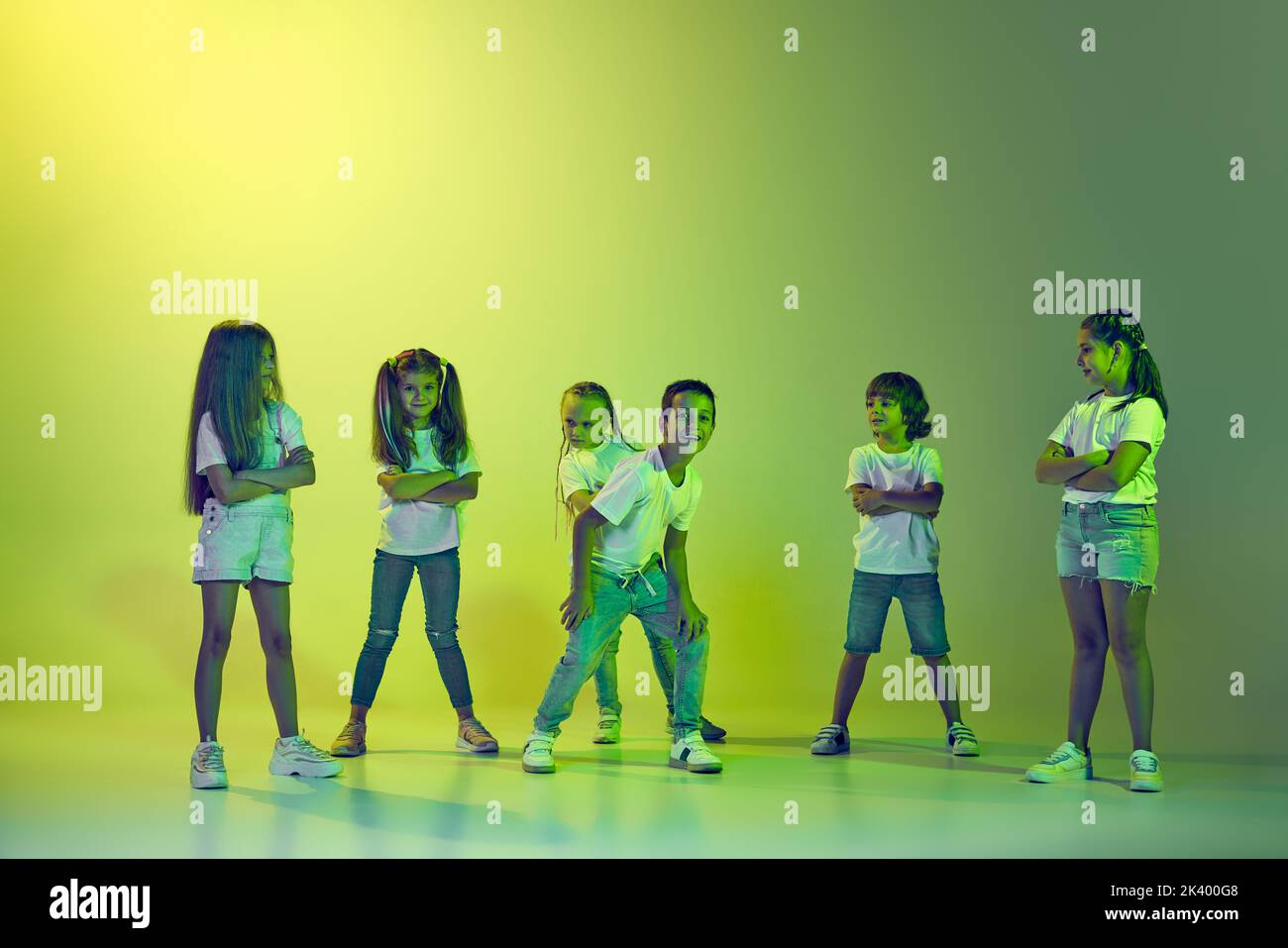 Group of children, little girls and boys in sportive casual style ...