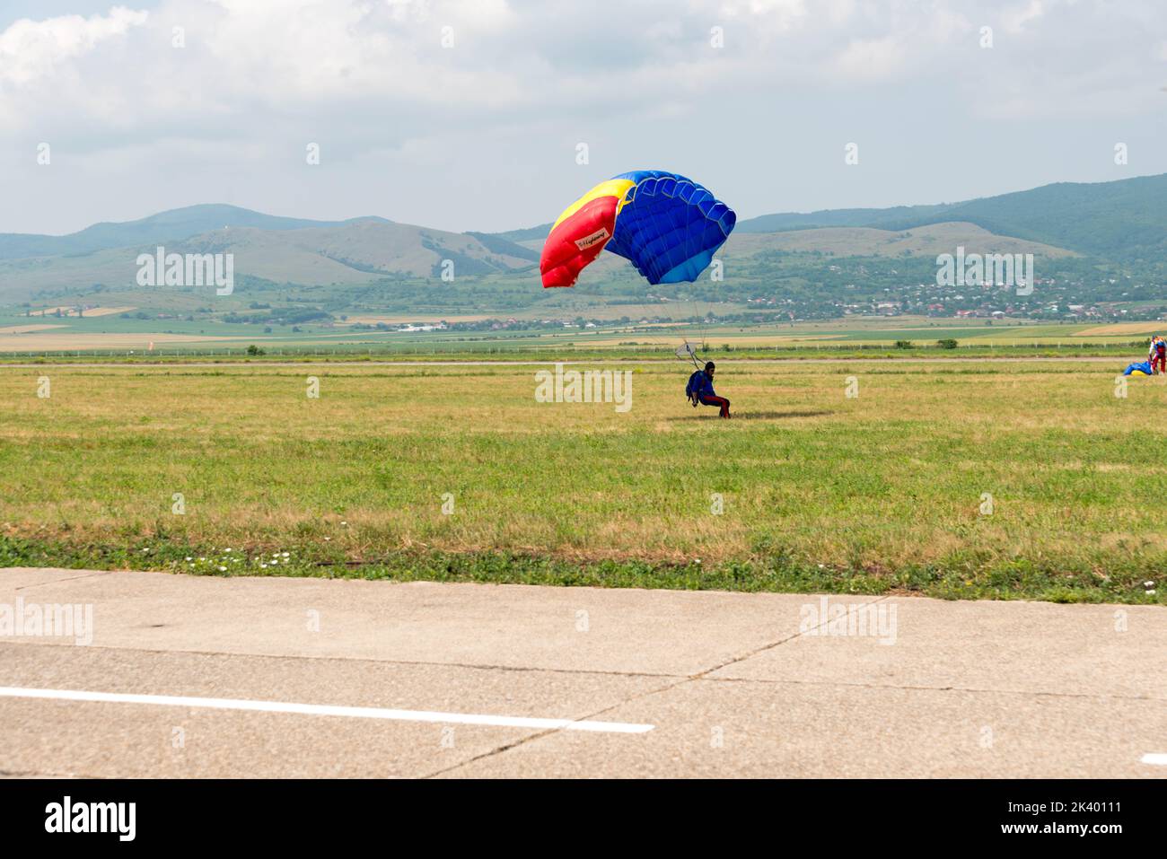 Skydiver reaches the land view Stock Photo - Alamy