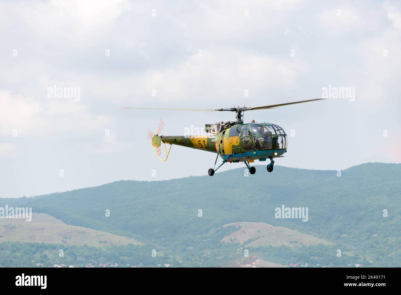 Army helicopter reaching the skyline Stock Photo - Alamy
