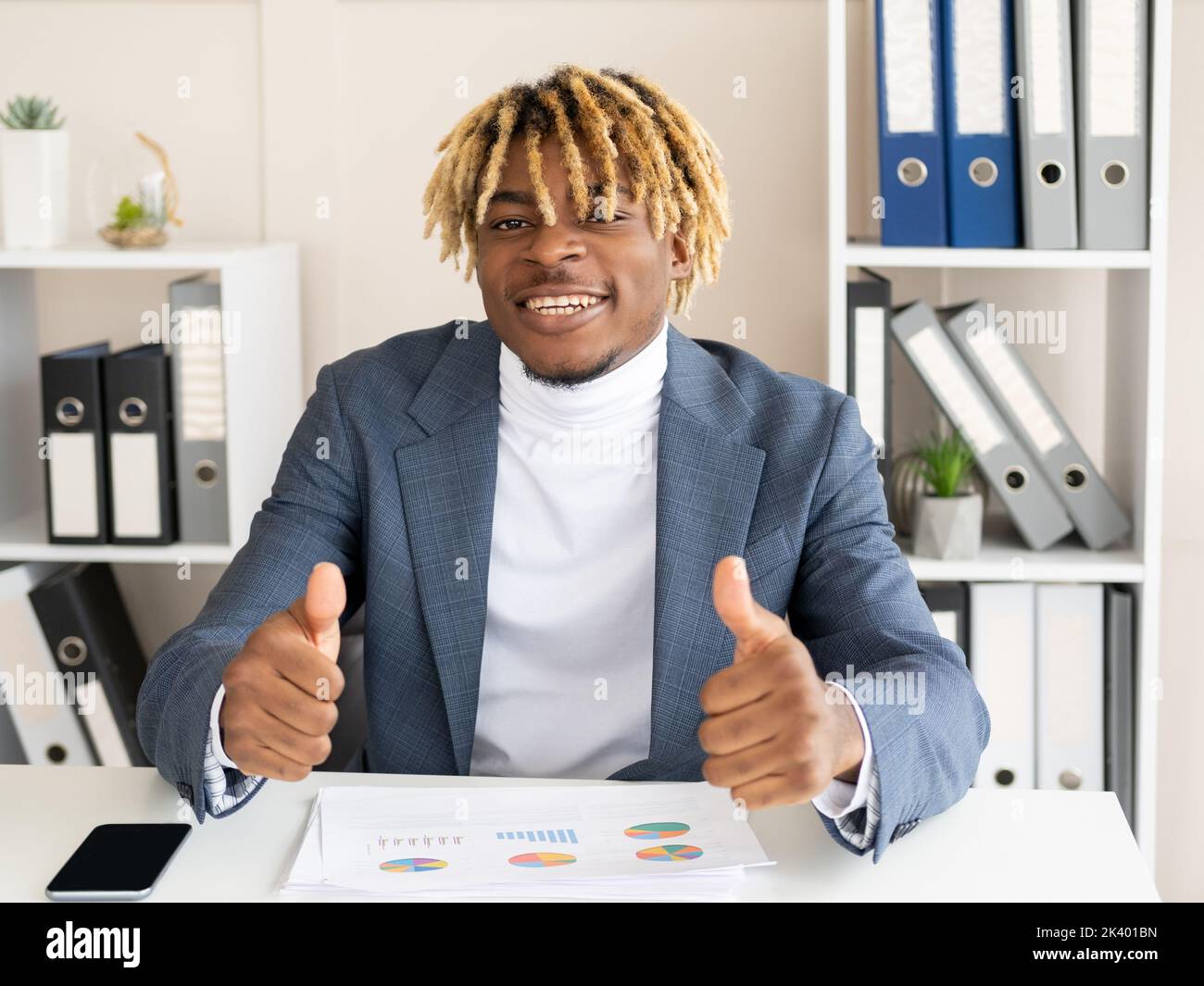 Good job. Positive black man. Successful result. Happy stylish guy ...