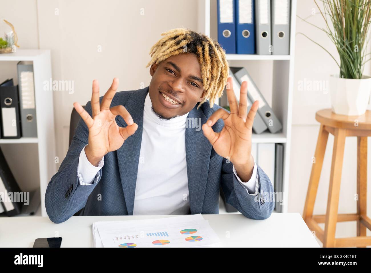 Great job. Happy black man. Successful achievement. Stylish positive ...