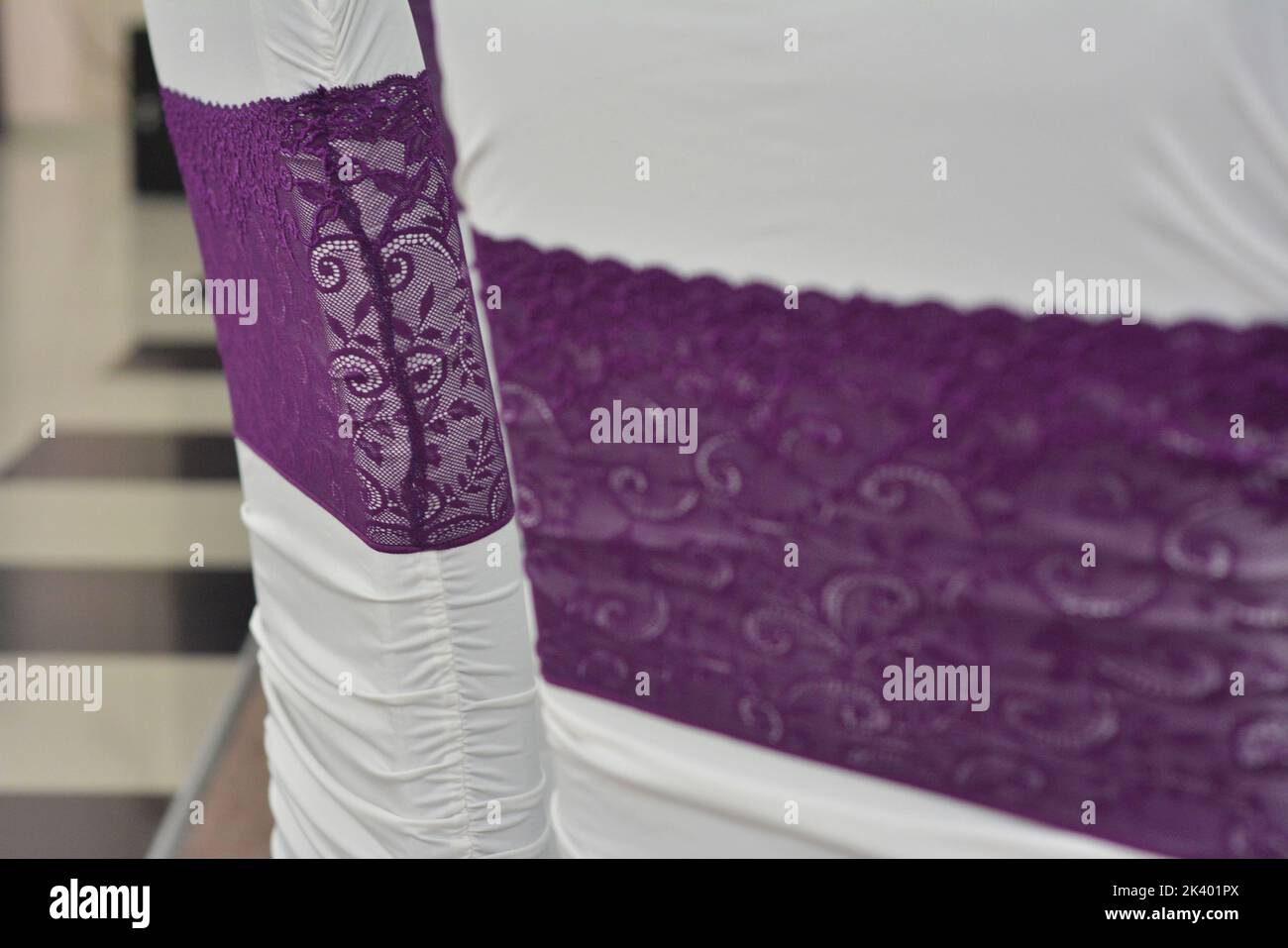 Pink details on a chair Stock Photo - Alamy