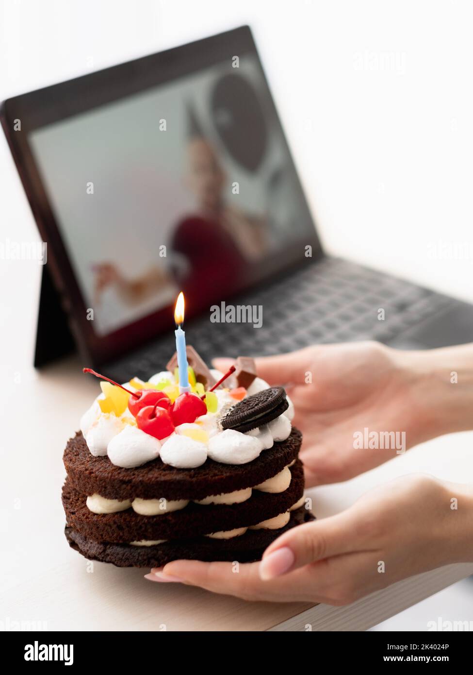 Virtual birthday. Festive cake. Online greeting. Unrecognizable woman ...