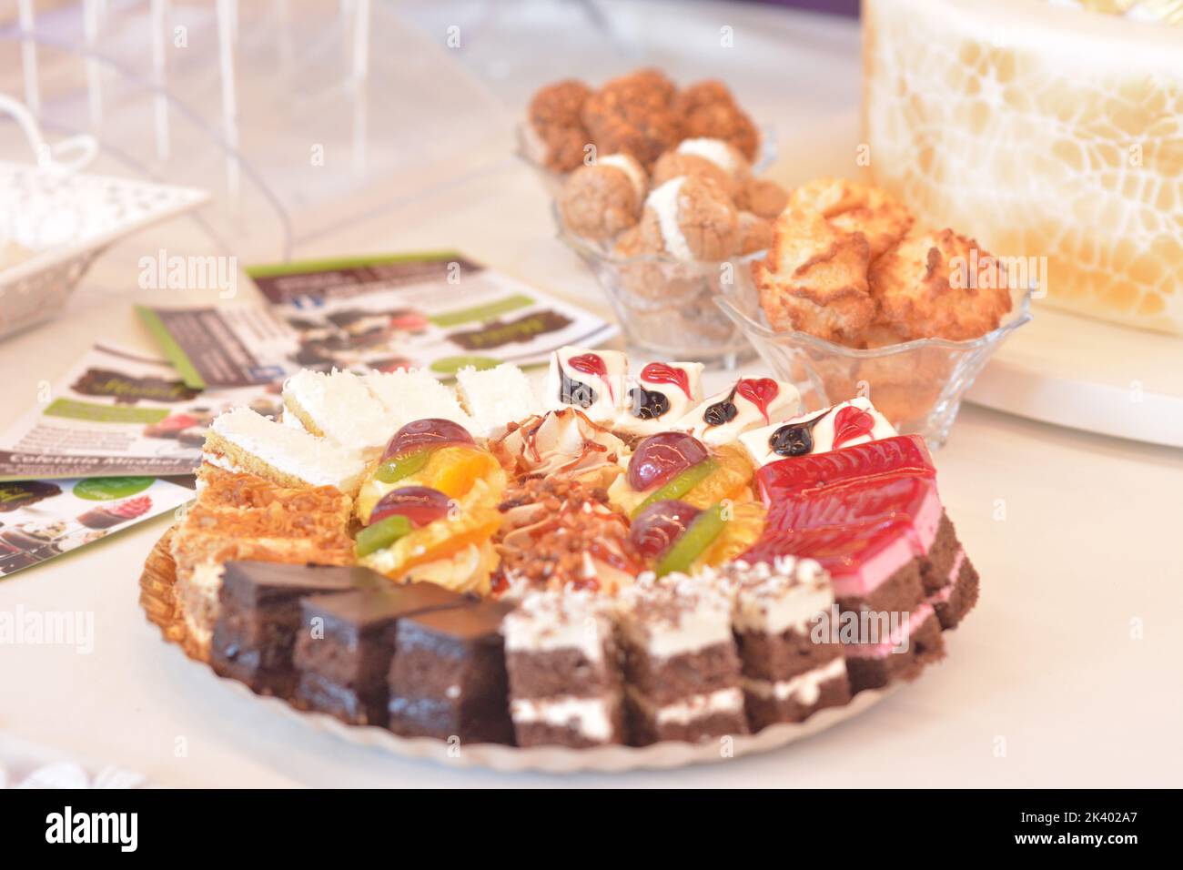 Platter with various cakes with cream in layers Stock Photo - Alamy