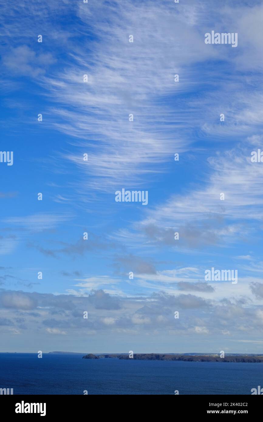 Summer sky with cirrus clouds on the north coast of Cornwall. Looking ...