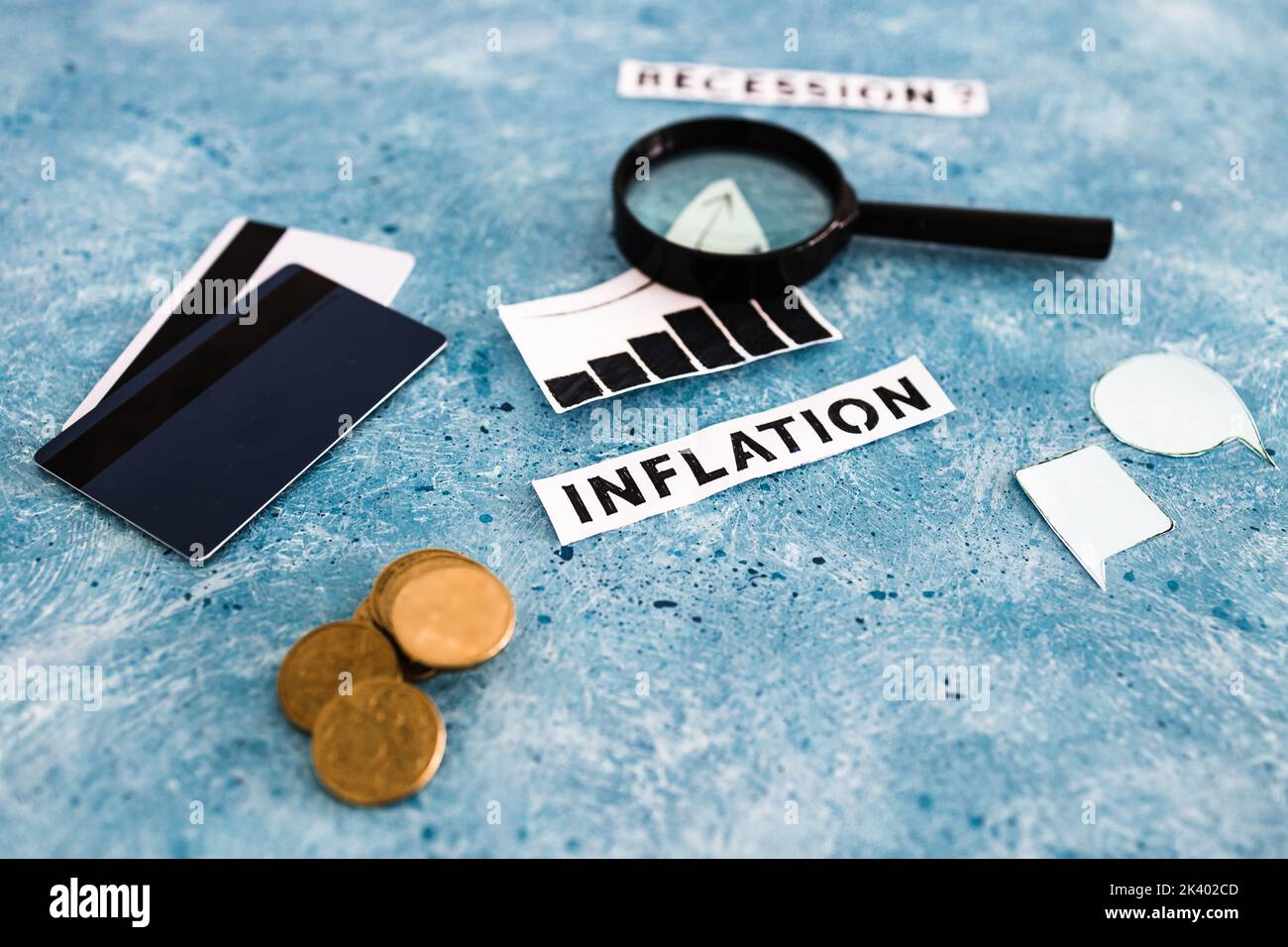 inflation text and graph showing prices going up with magnifying glass ...