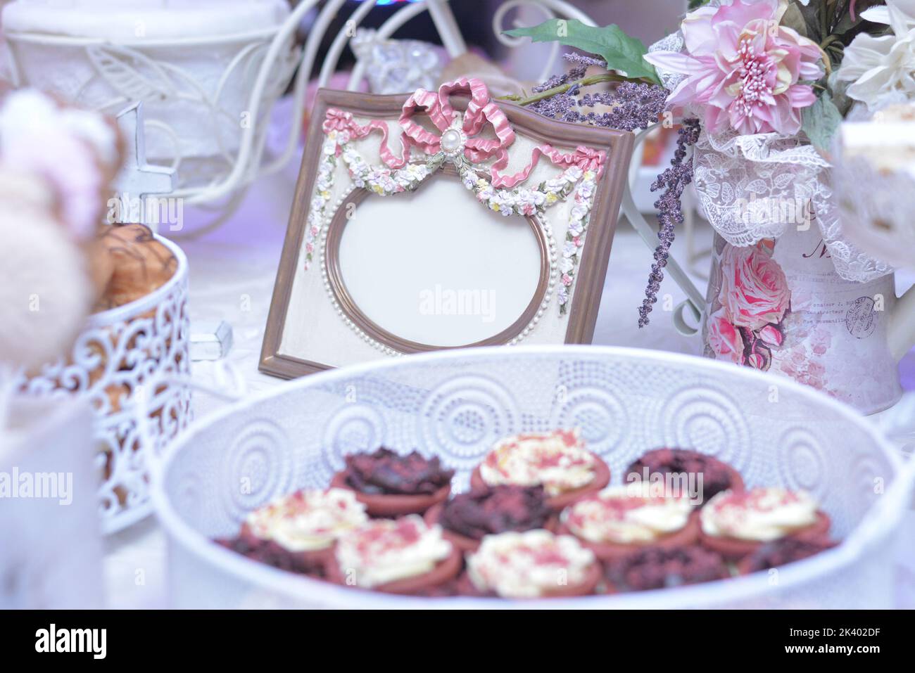 Baroque photo frame with pink bow Stock Photo - Alamy