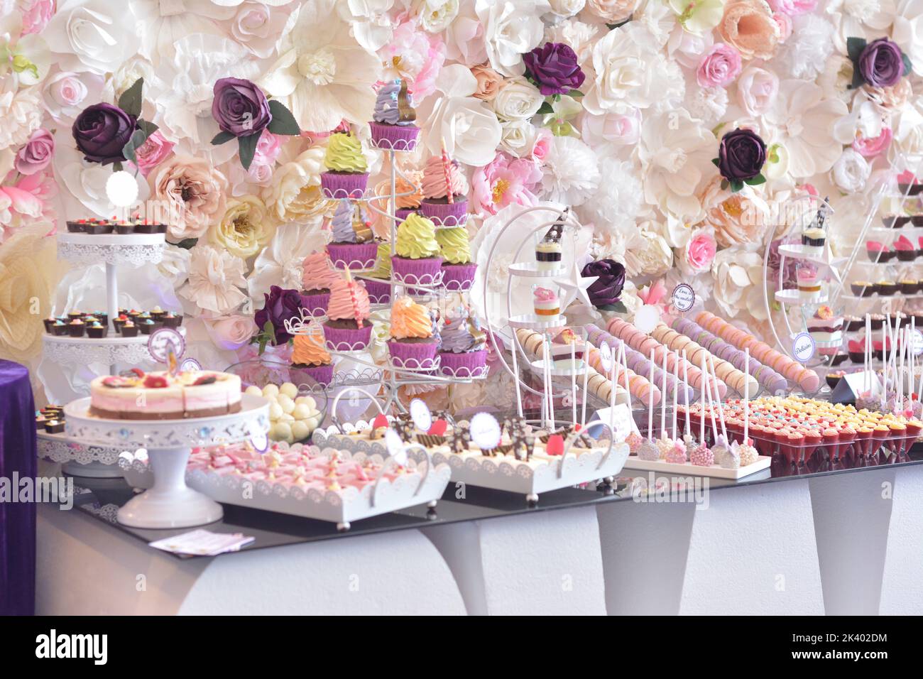 Delicious sweet buffet with cupcakes Stock Photo - Alamy