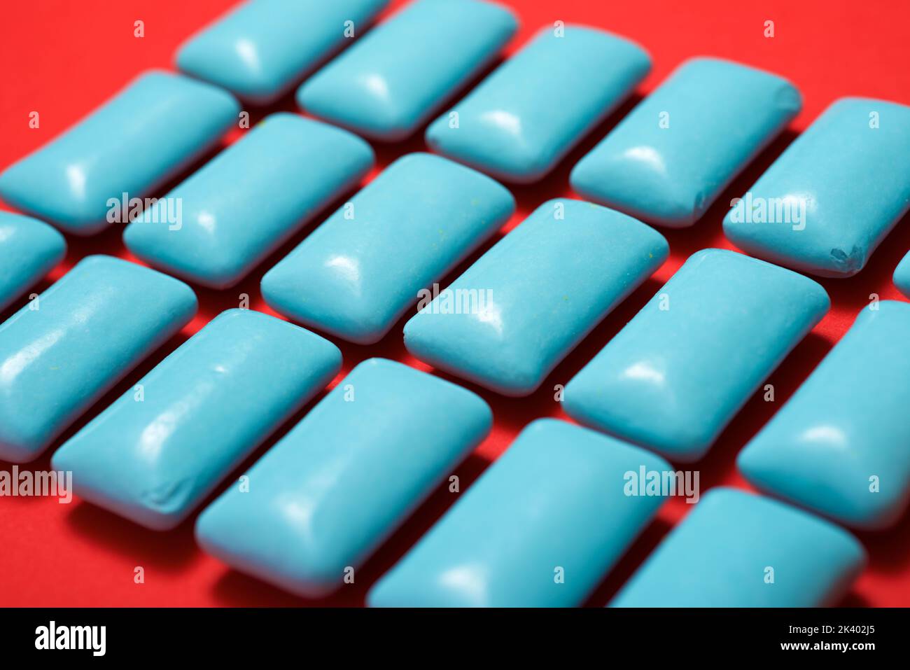 Chewing gum aligned on a table Stock Photo - Alamy