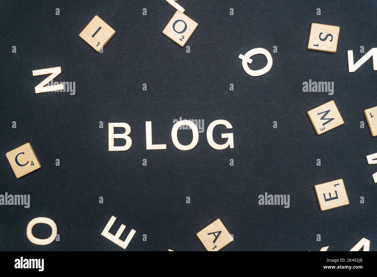 BLOG word written on dark paper background. BLOG text on dark for your ...