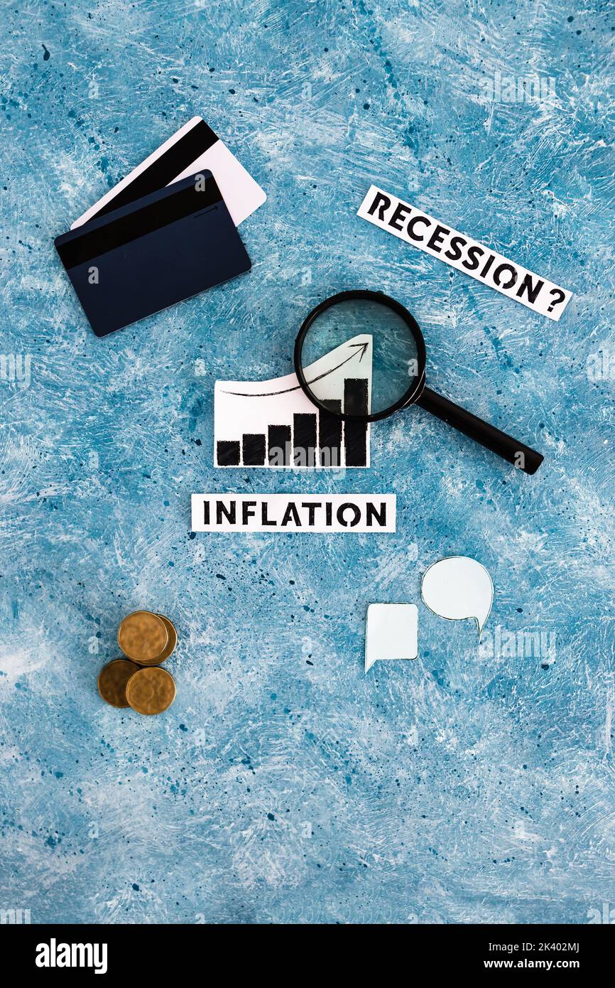 inflation text and graph showing prices going up with magnifying glass ...