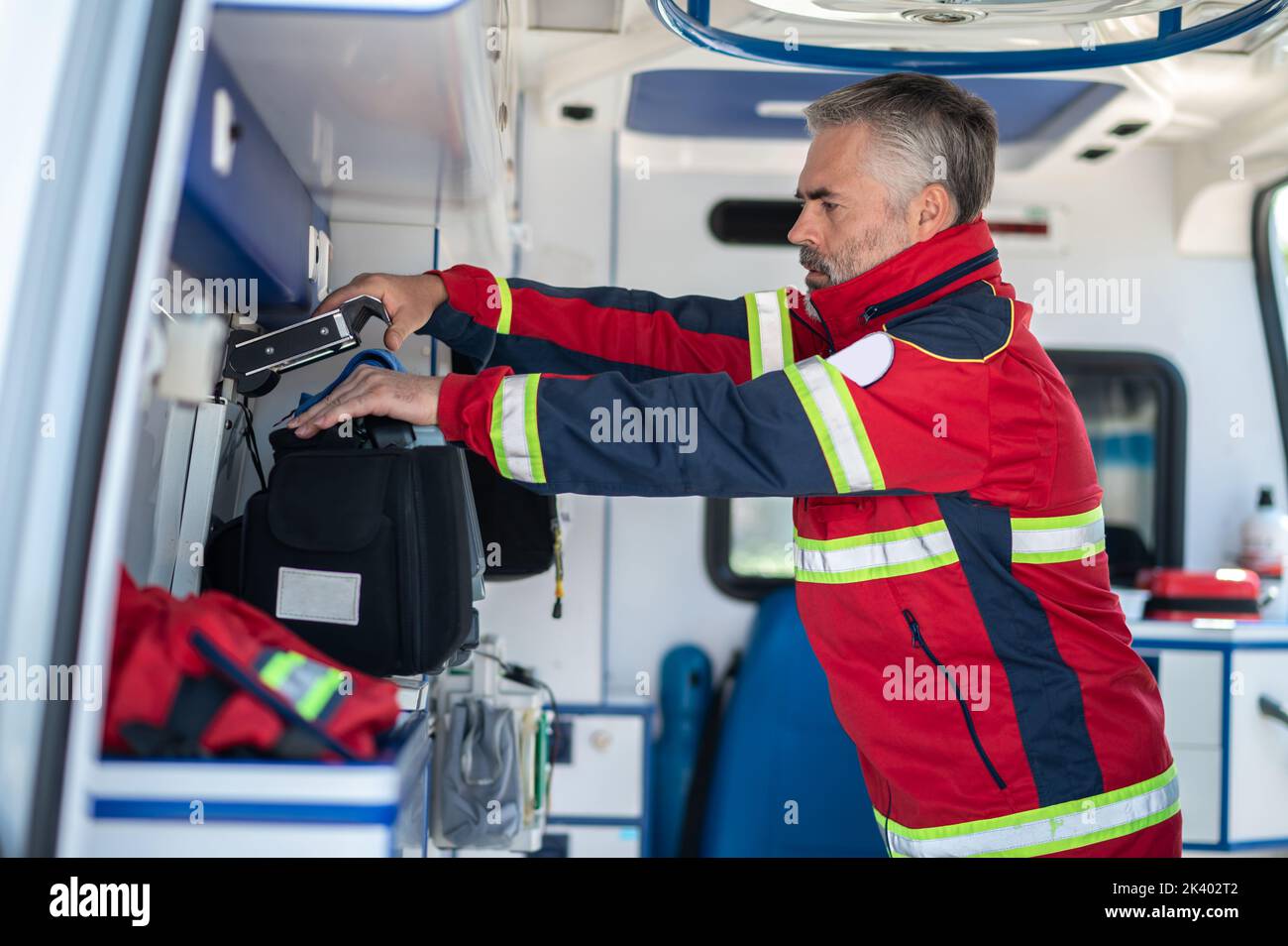 Doctor preparing the medical equipment for patient monitoring Stock ...