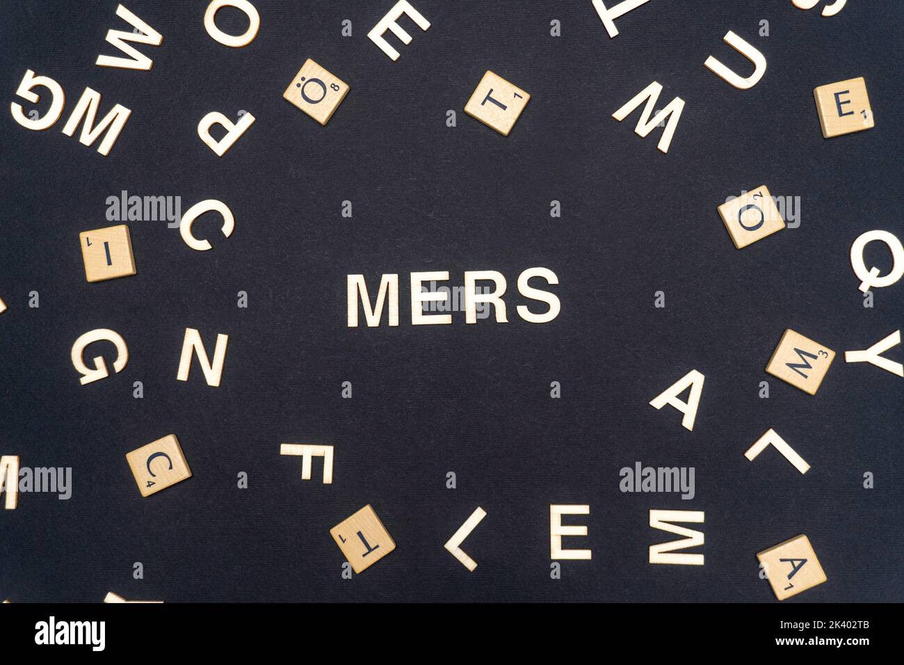 MERS word written on dark paper background. MERS text on dark for your ...