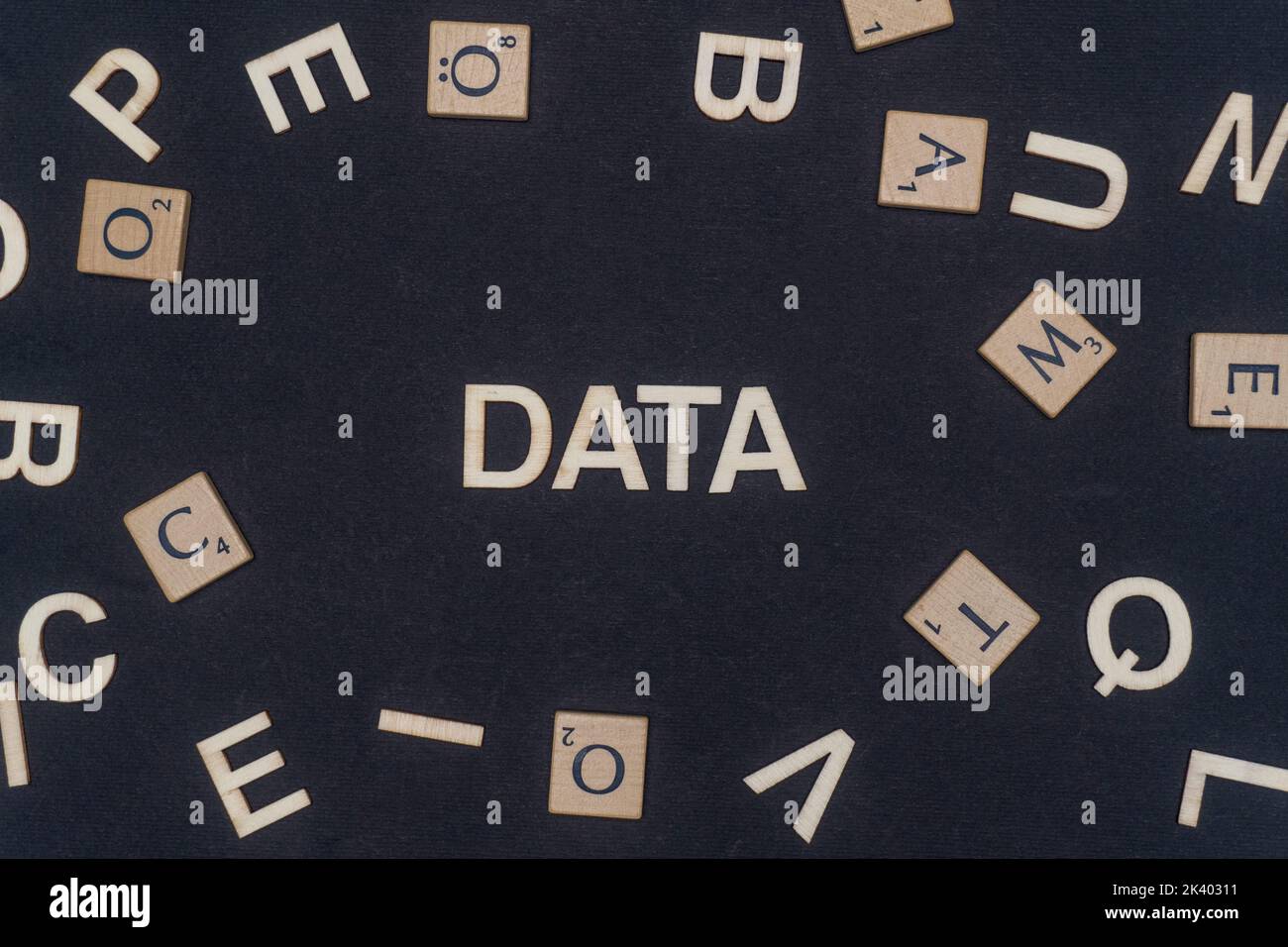 DATA word written on dark paper background. DATA text on dark for your ...