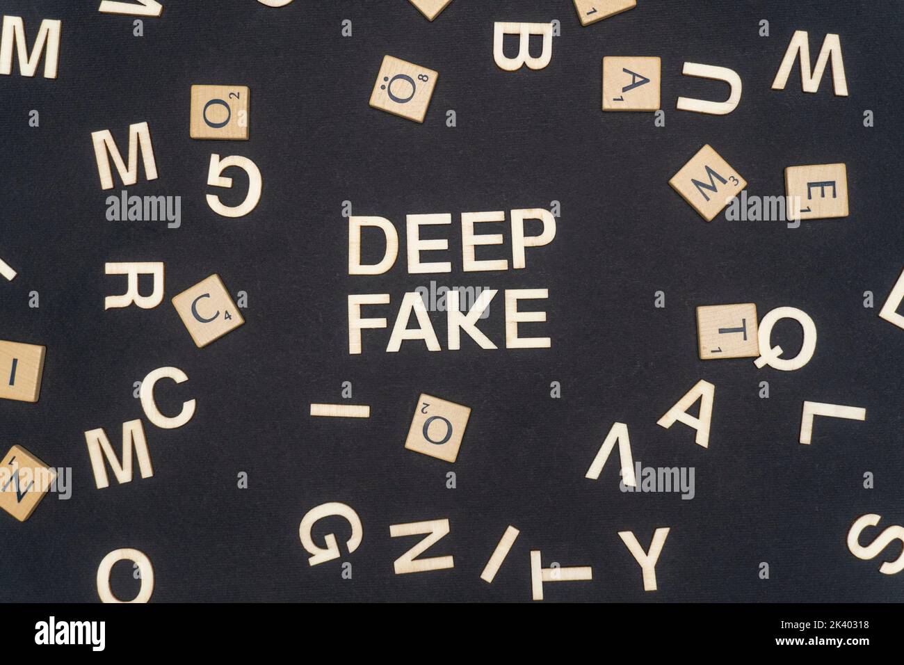 DEEP FAKE word written on dark paper background. DEEP FAKE text on dark ...