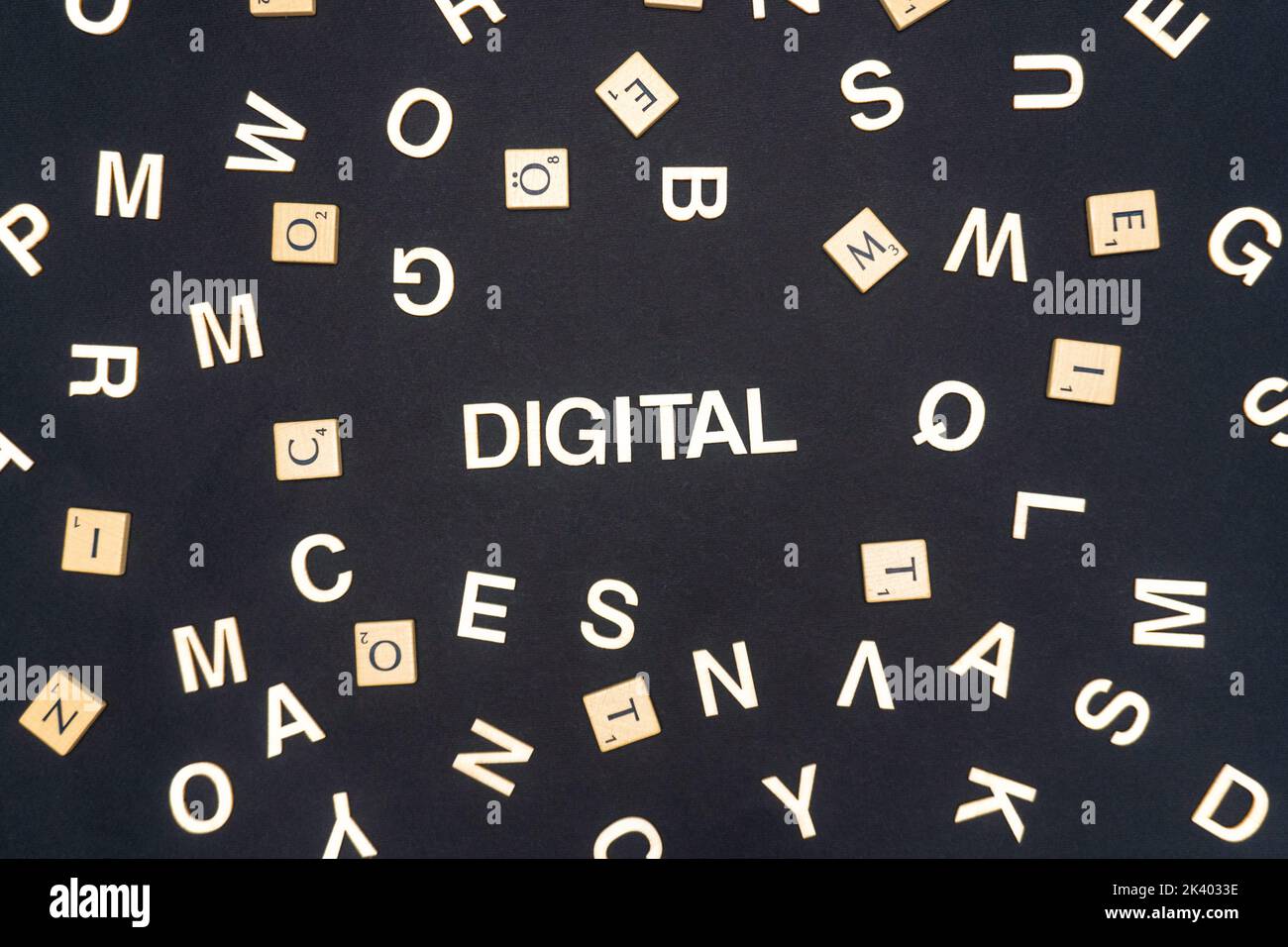 DIGITAL word written on dark paper background. DIGITAL text on dark for ...