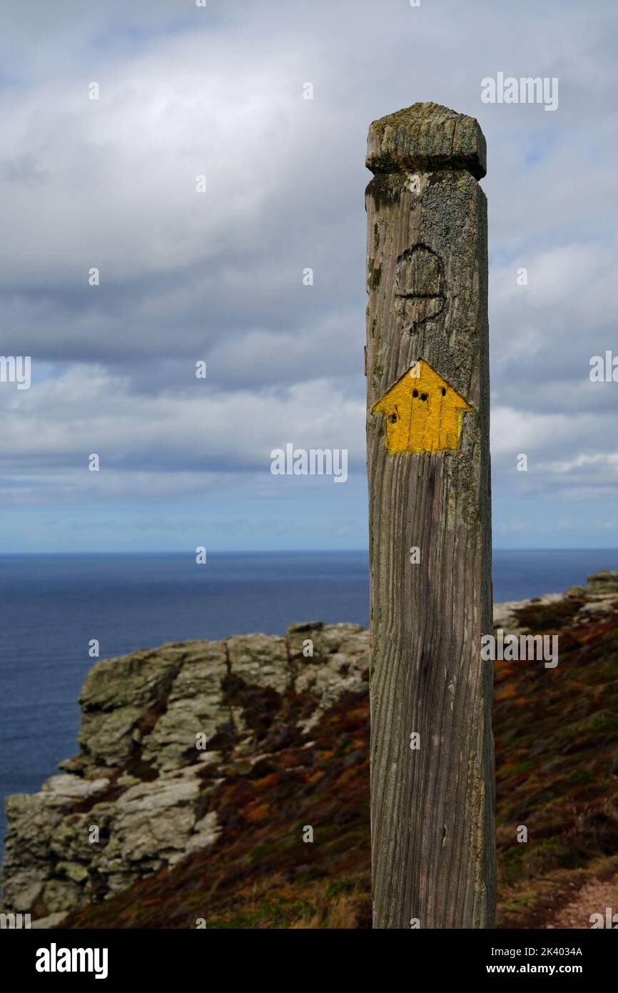 Signpost marking the South West Coast Path, a long distance footpath ...