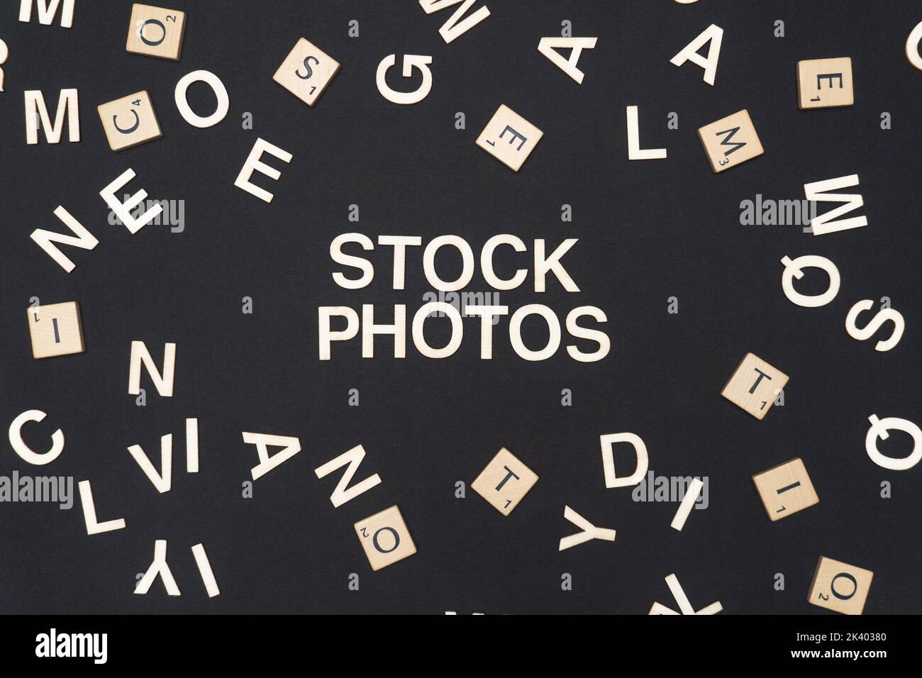 STOCK PHOTOS word written on dark paper background. STOCK PHOTOS text ...