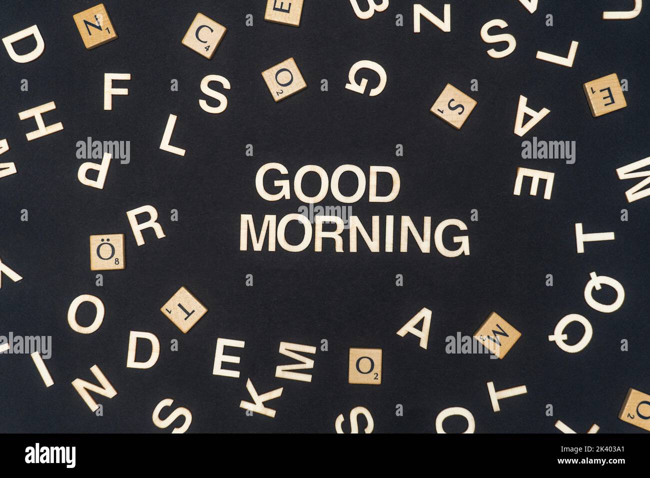 GOOD MORNING word written on dark paper background. GOOD MORNING text ...