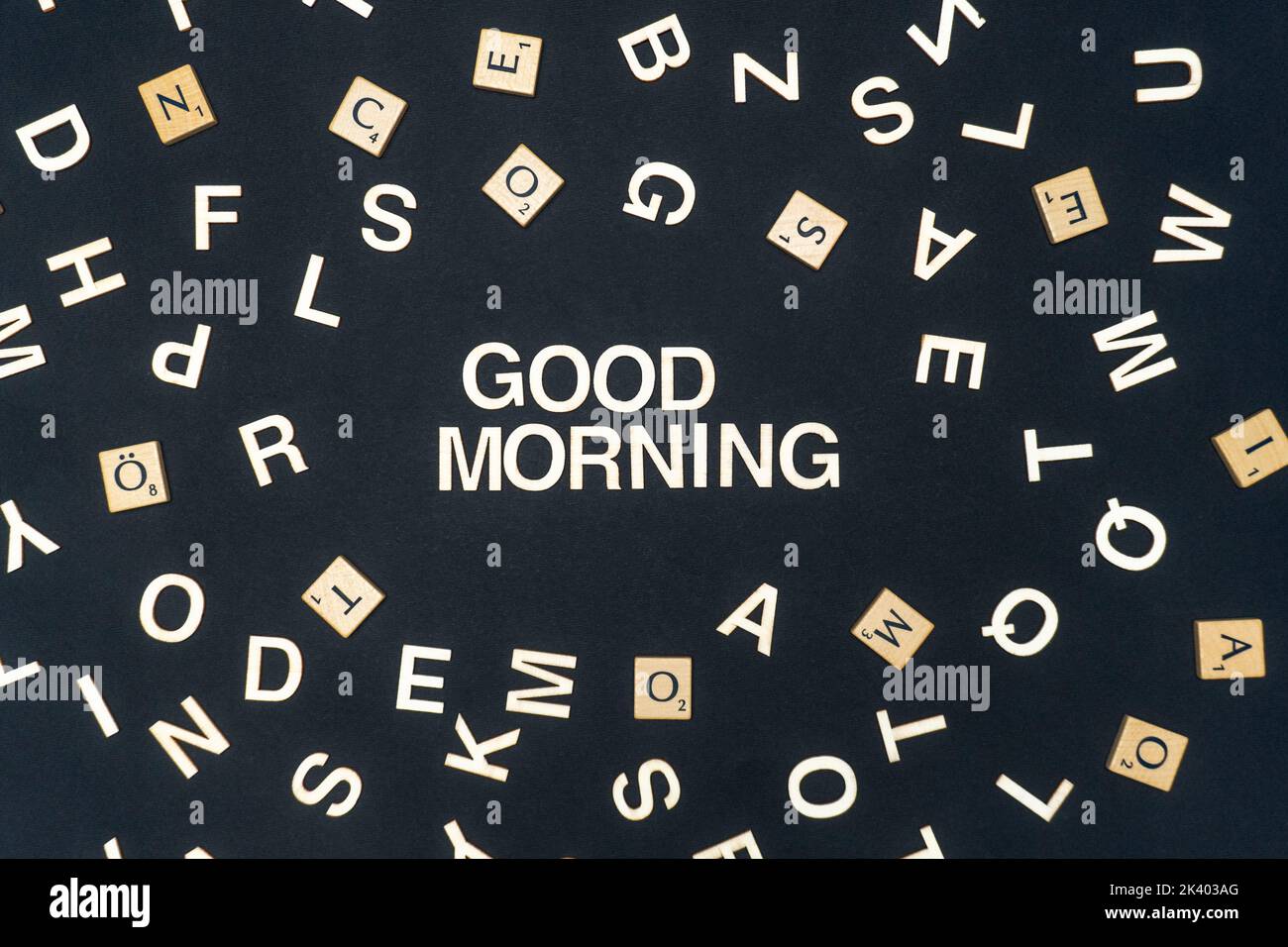 GOOD MORNING word written on dark paper background. GOOD MORNING text ...