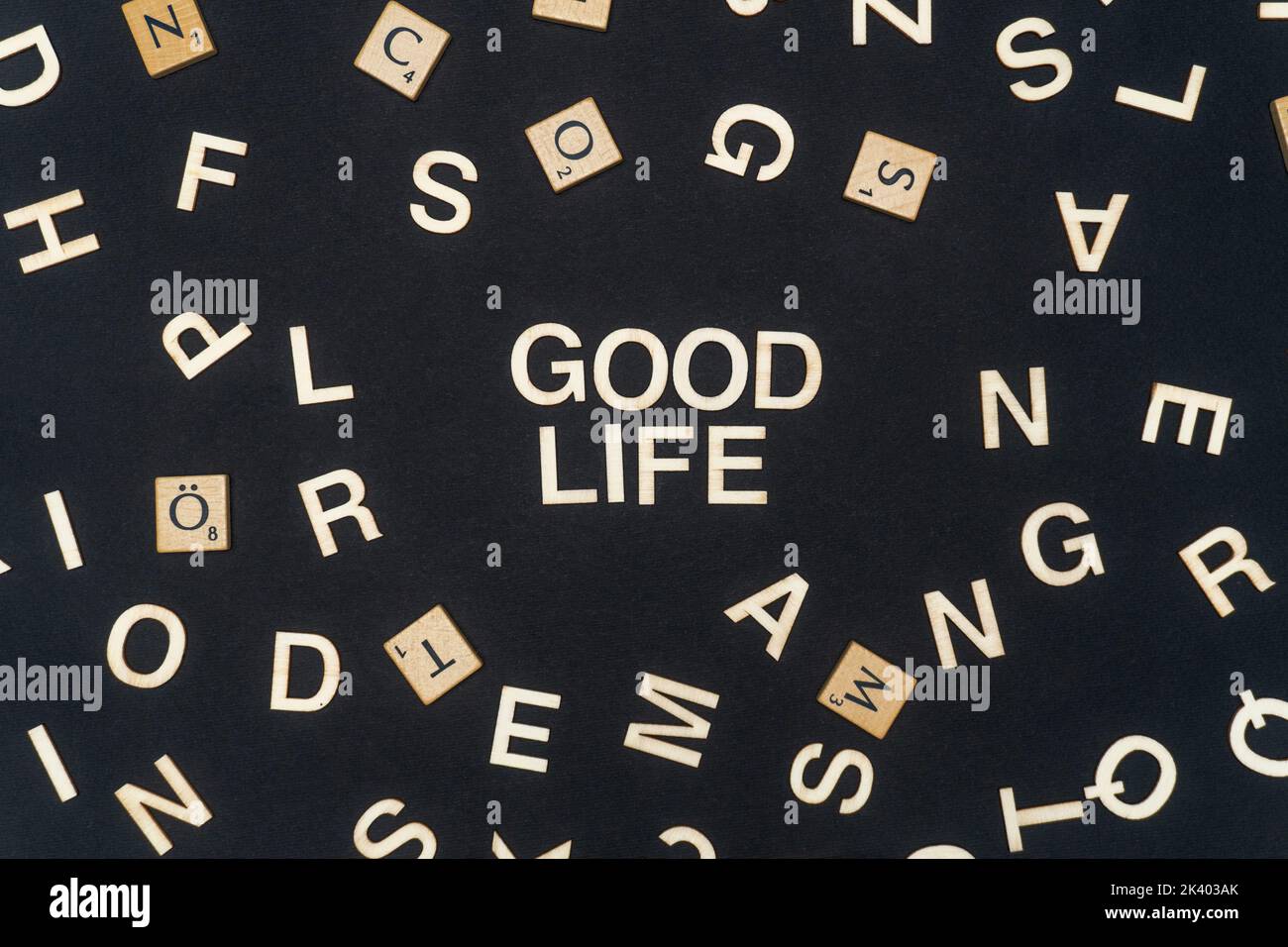 GOOD LIFE word written on dark paper background. GOOD LIFE text on dark ...