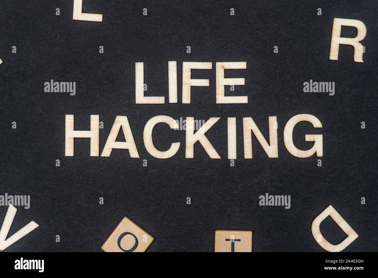 LIFE HACKING word written on dark paper background. LIFE HACKING text ...