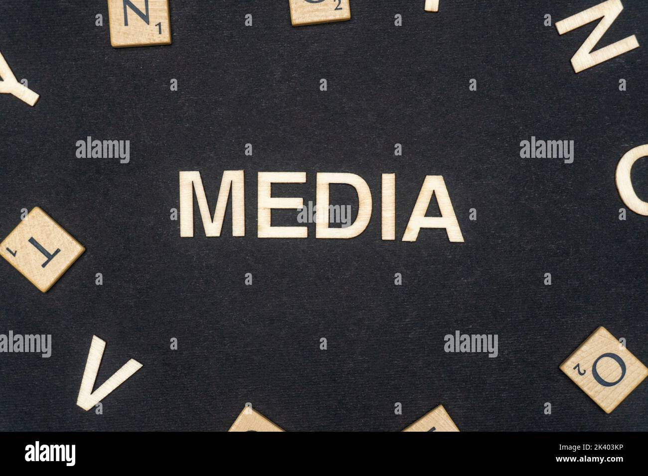 MEDIA word written on dark paper background. MEDIA text on dark for ...