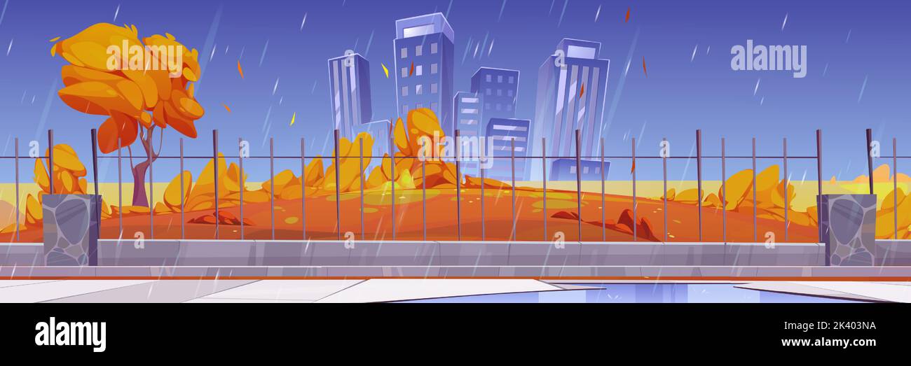 Cityscape with park and houses behind metal fence in rain. Autumn ...