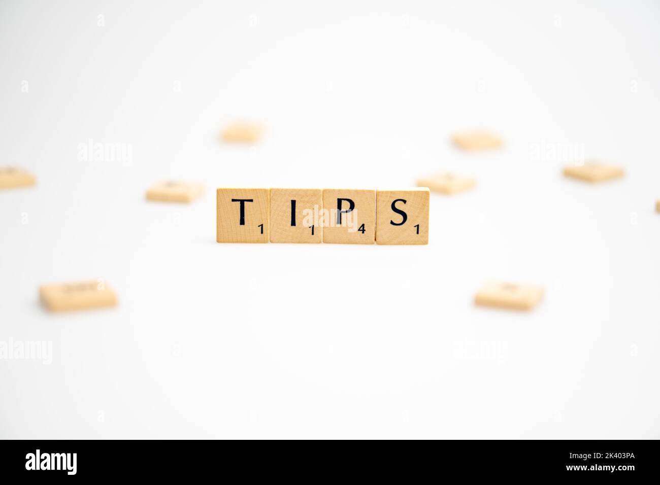 TIPS word written on white background. TIPS text on white for your ...