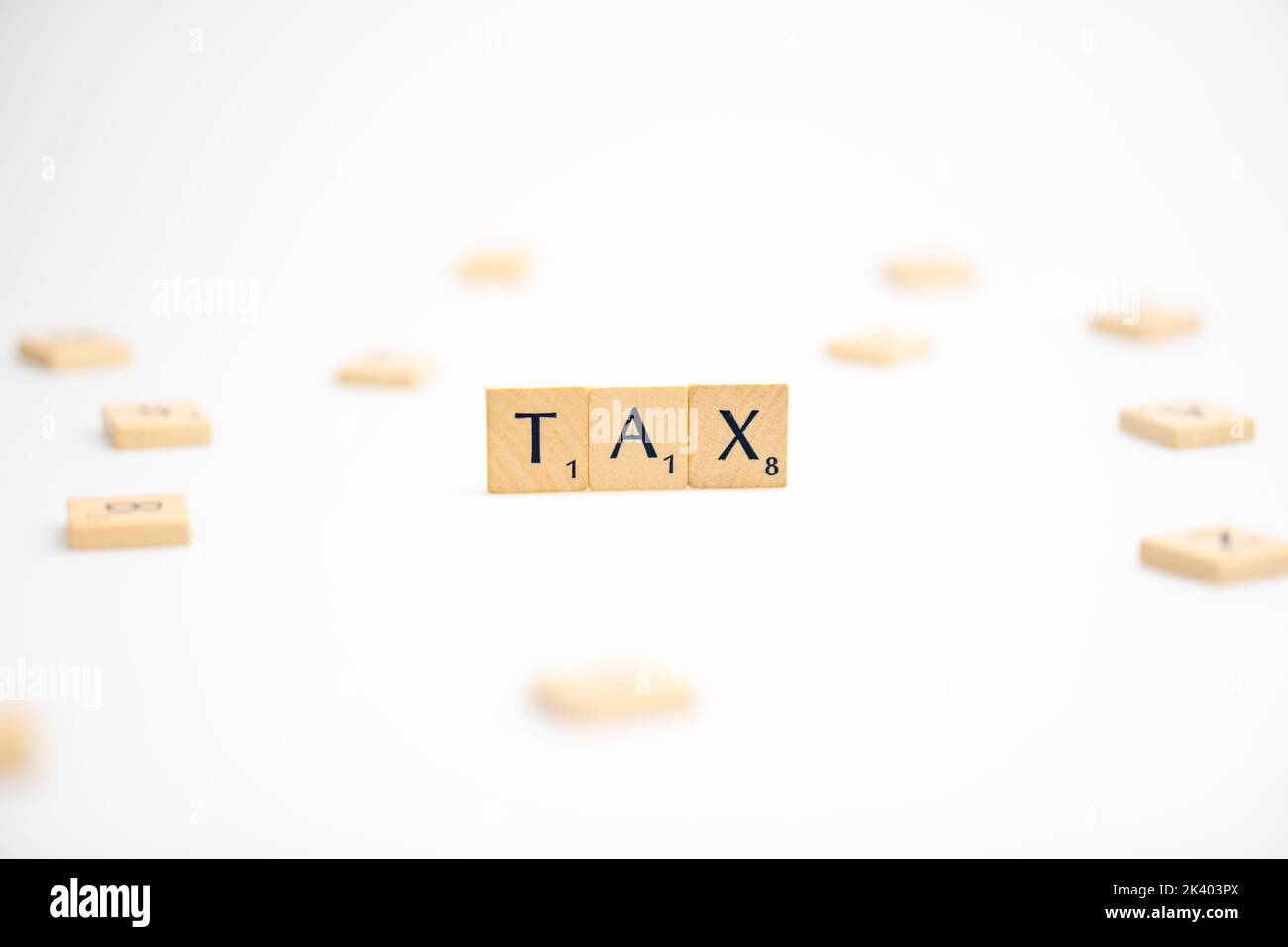 TAX word written on white background. TAX text on white for your ...