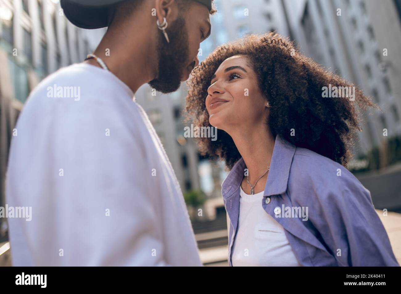 A young couple looking happy and excited Stock Photo - Alamy