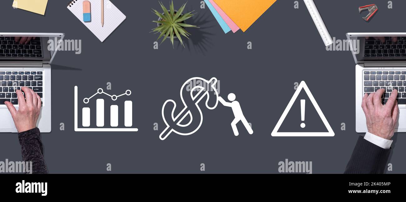 Top view of hands using laptop with symbol of crisis management concept ...