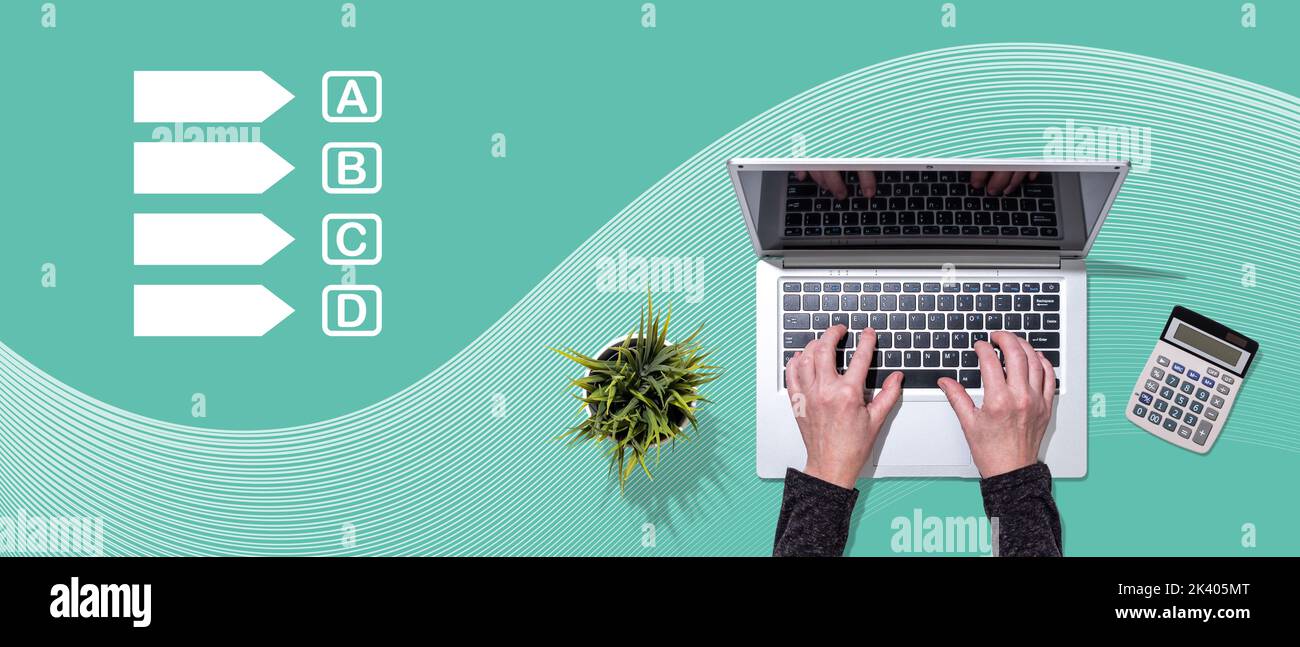 Top view of hands using laptop with symbol of efficiency concept Stock ...