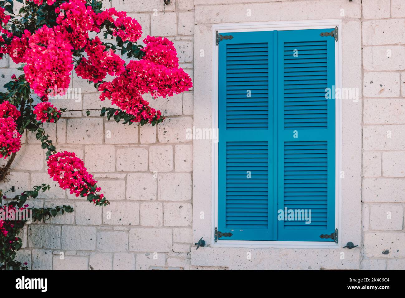 old Greek shutter window at a Greek village. Holiday vacation concept ...