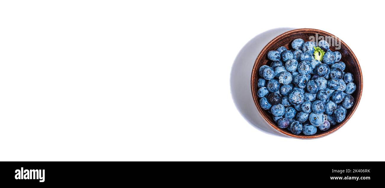 Bowl of ripe blueberries isolated on white background. Fresh fruits ...