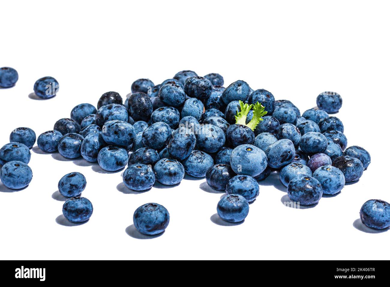 Harvest of ripe blueberries isolated on white background. Fresh fruits ...