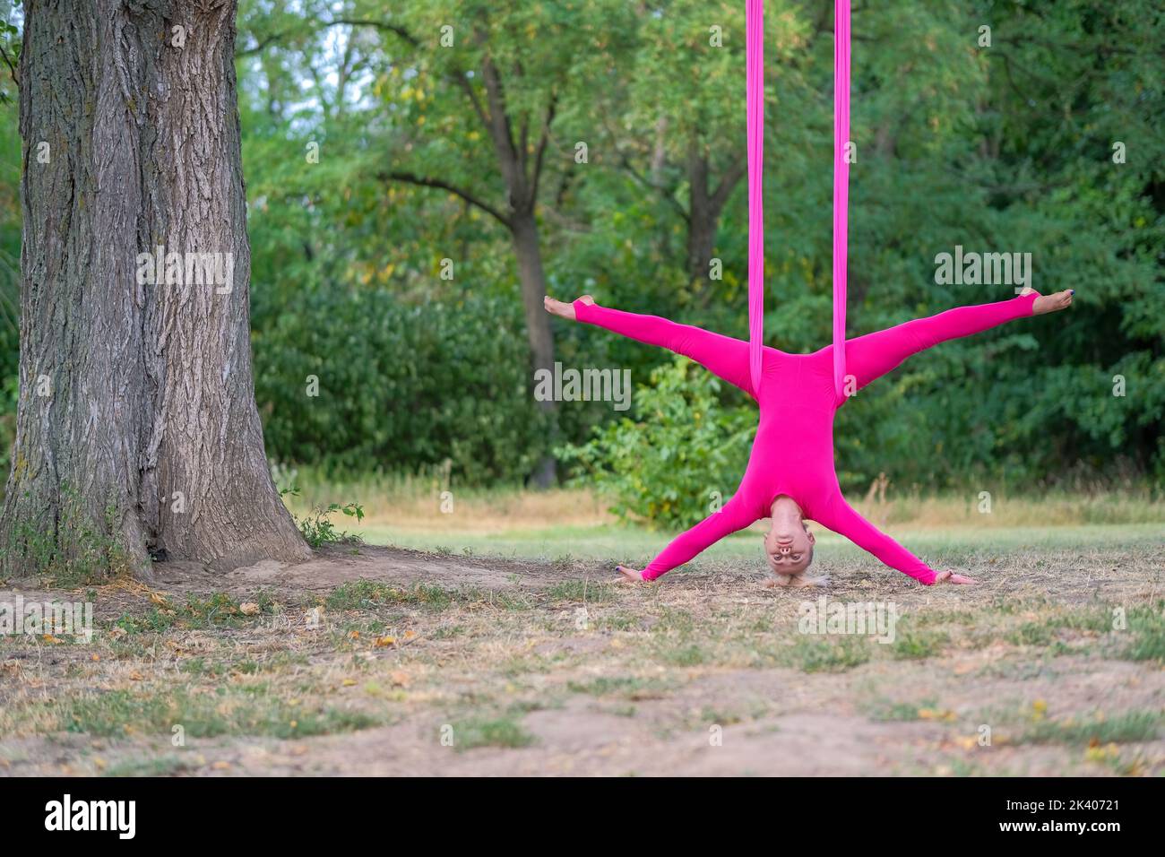 Aerial yoga stretching hi-res stock photography and images - Alamy