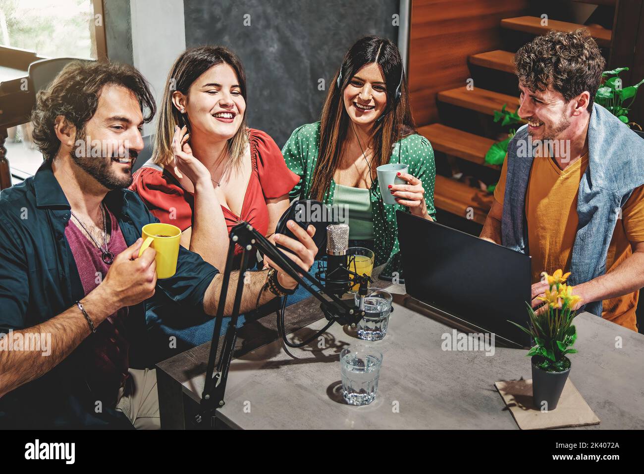 Group of young people, content creators, sharing content online ...