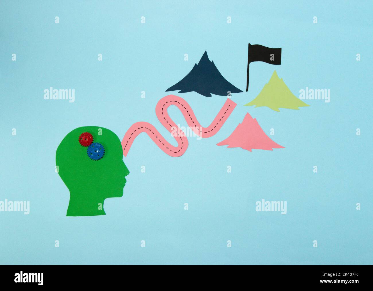 business paper head that thinks and creates a way to the top of the ...