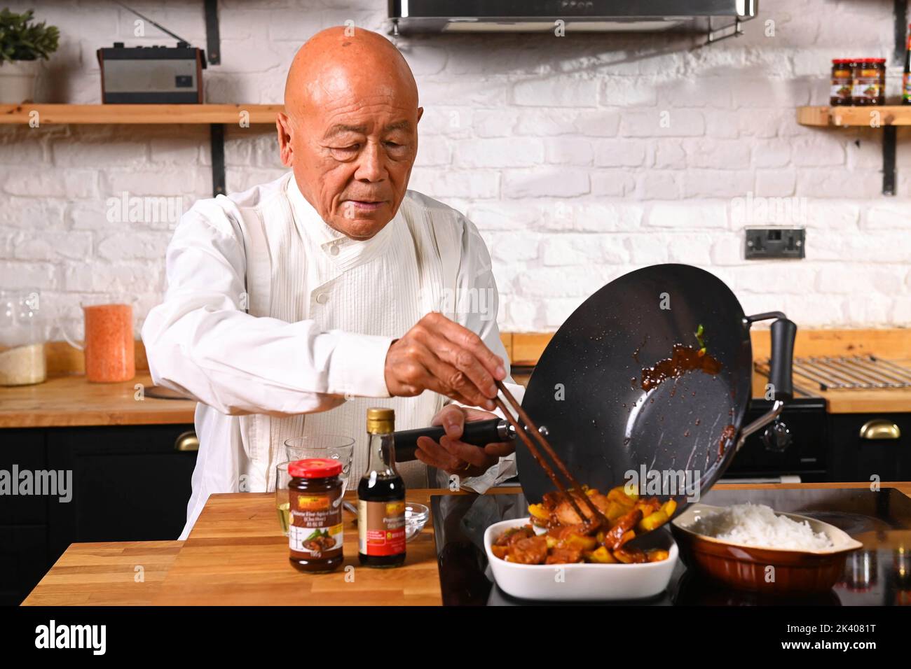 EDITORIAL USE ONLY Ken Hom cooks 'Ken's Pork with Chu Hou Sauce' from ...