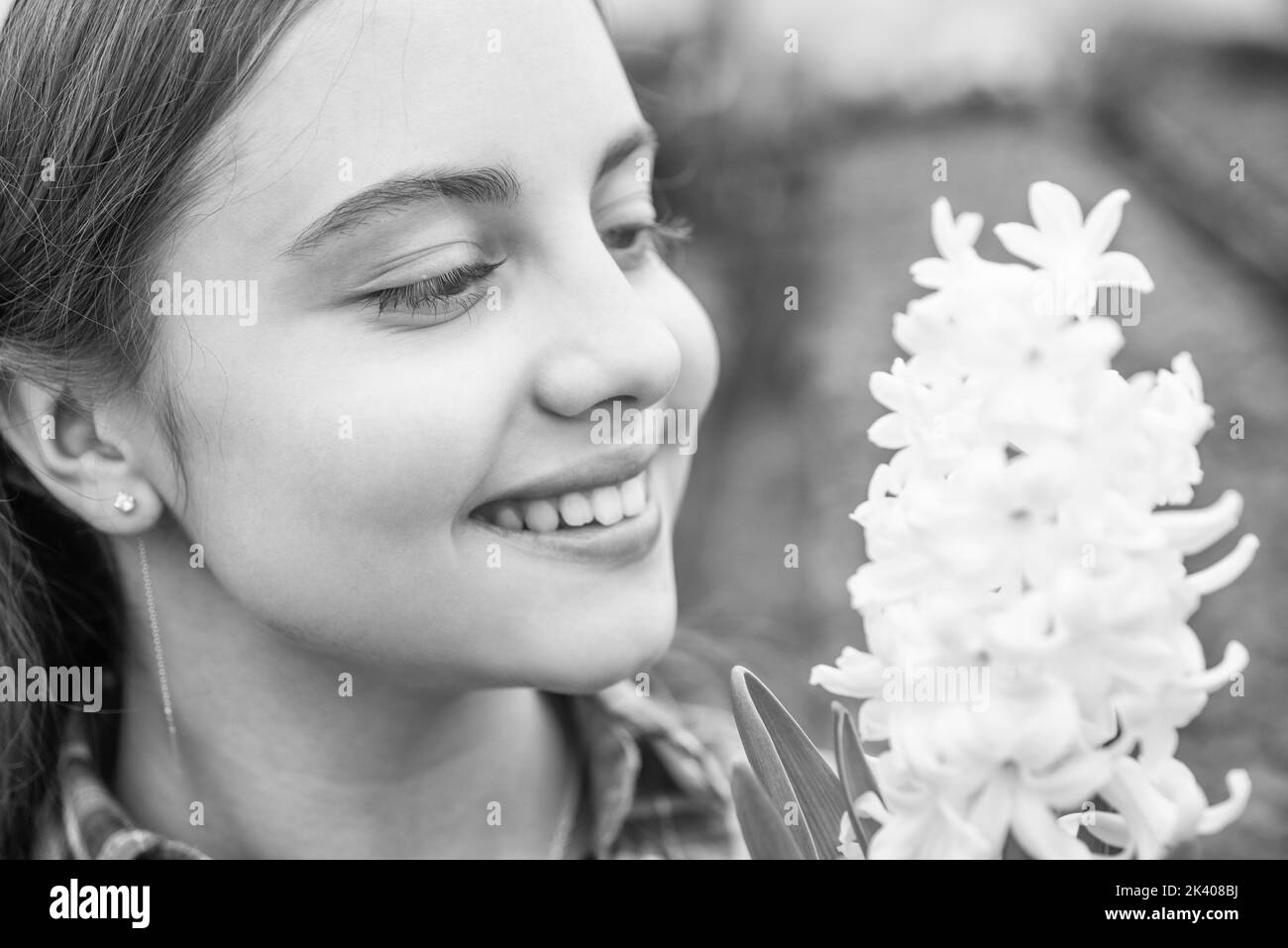 organic. child gardener. flowers in garden. daily chores. flower care ...